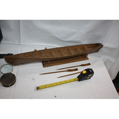 Wooden rowing boat on stand 23" l.
