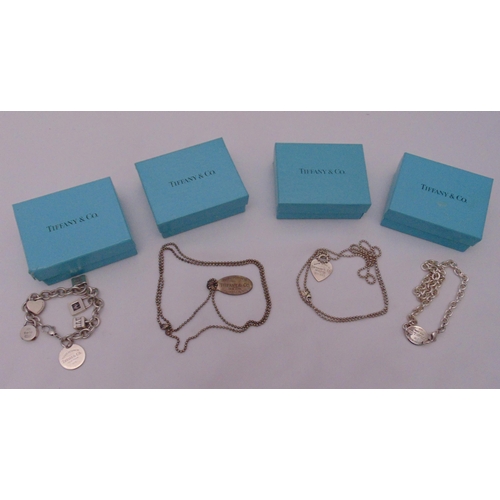 Tiffany and Co. silver jewellery to include three chains and a bracelet ...