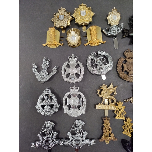 Job lot of vintage military badges, cap badges and buttons
