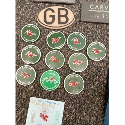 Collection of vintage caravanning and motoring badges.