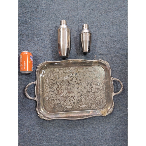 A viners of Sheffield silver plate platter tray and two cocktail shakers.