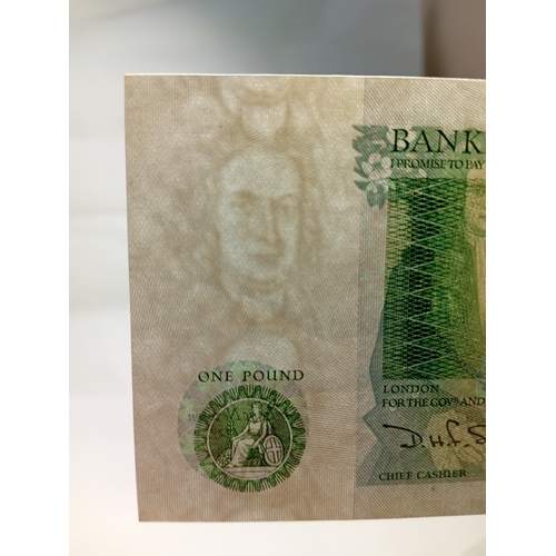 A vintage bank of England one pound note. Serial number DW29 592450