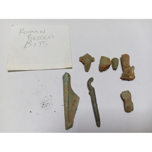 A collection of roman fibula brooch bits found metal detecting