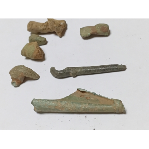 A collection of roman fibula brooch bits found metal detecting