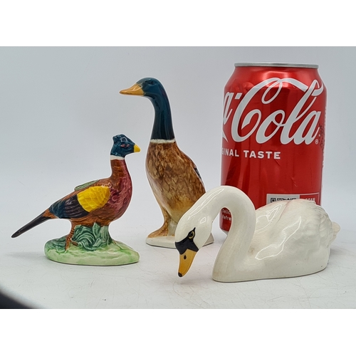 A collection of 3 Beswick ceramic Birds to include: a Mallard Duck no ...