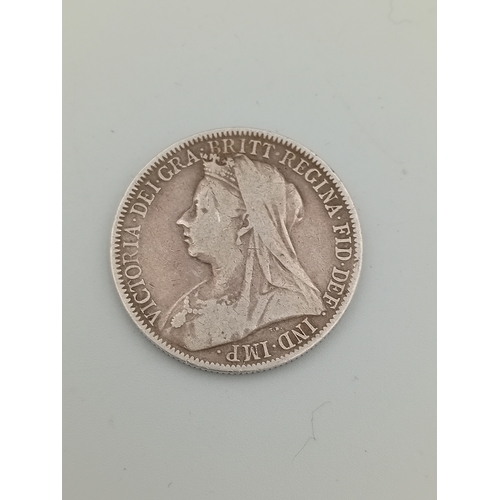 An 1899 Victoria sterling silver One Florin coin.