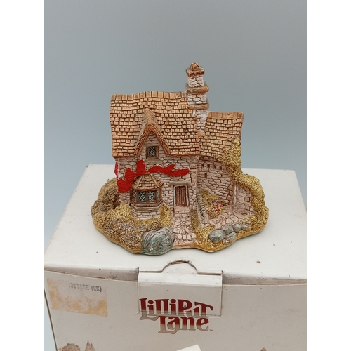 A collection of 4 vintage Lilliput Lane houses to include Chestnut ...
