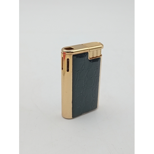 A vintage 1970s Noble electronic butane lighter and original sales receipt.