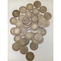 A collection of 500 silver half crowns from 1920-1935. Weight 336g
