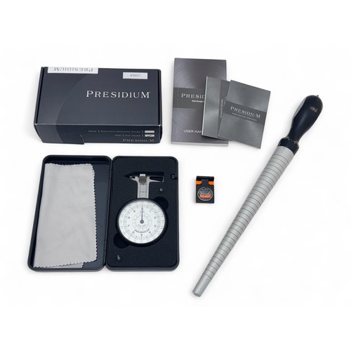 A Presidium Dial Gauge, boxed. Together with a ring sizer and a Shindler Scale.