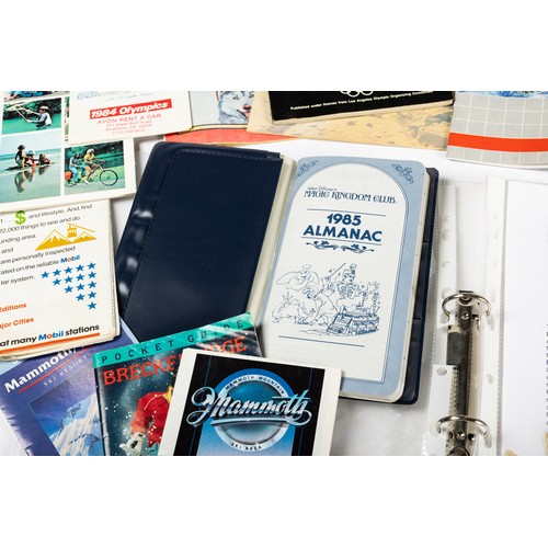 A collection of ephemera, includes two Silverstone badges from 1975, a ...
