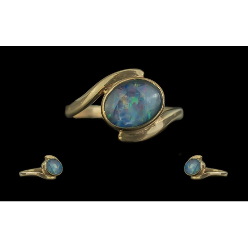 Black Opal Ring Set In 9ct Gold. Black Fire Opal Set In Yellow 9ct Gold. The Ring of Twist Design. M