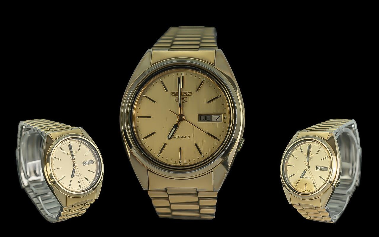 Seiko 5 - Gents Gold on Steel Automatic Wrist Watch. Features Champagne ...