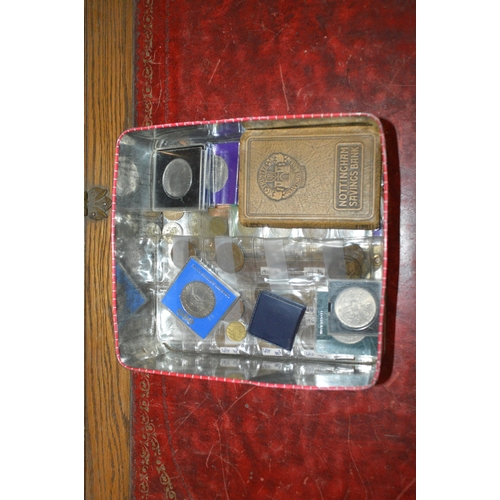 tin of collectable coins