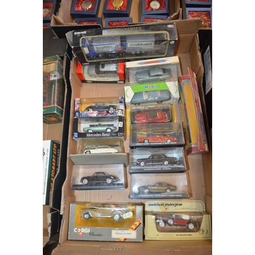 box of assorted toy vehicles