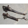 Two 19th Century Cast Iron Traps. Largest 64cm