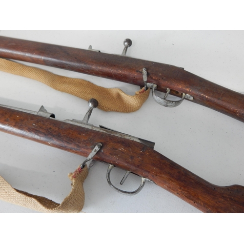 WWII: A Pair of Detailed Working Action Practice Rifles.