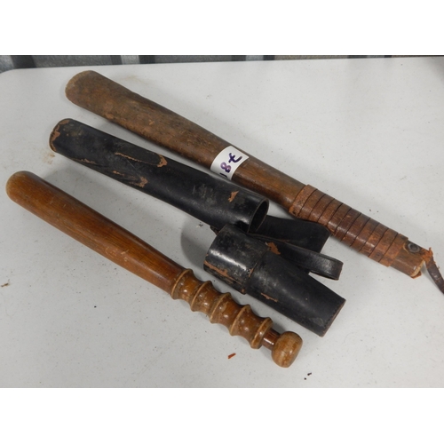 One leather cased police truncheon plus one other