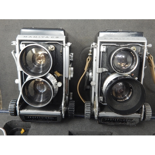 2 x Mamiya Professional Cameras with Additional Lens in Case.