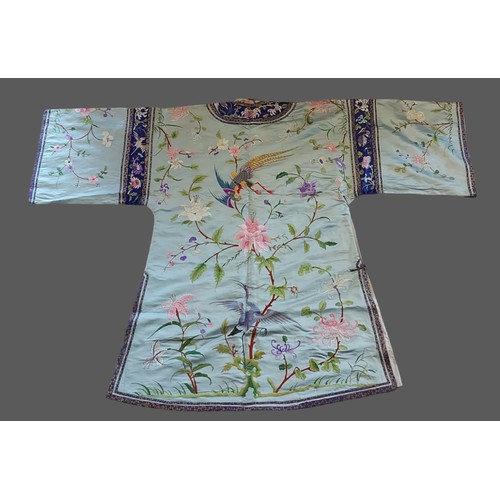 A Chinese silkwork Kimono, decorated with exotic birds amongst foliage ...