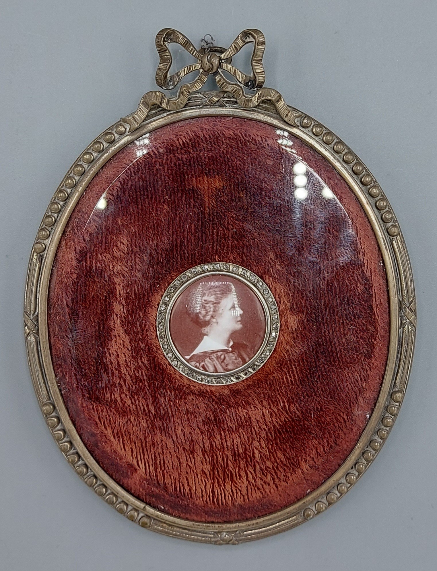 A 19th Century circular portrait miniature, portrait of a lady with ...