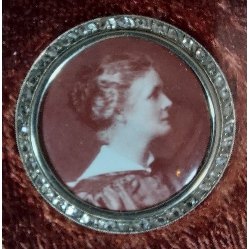 A 19th Century circular portrait miniature, portrait of a lady with ...