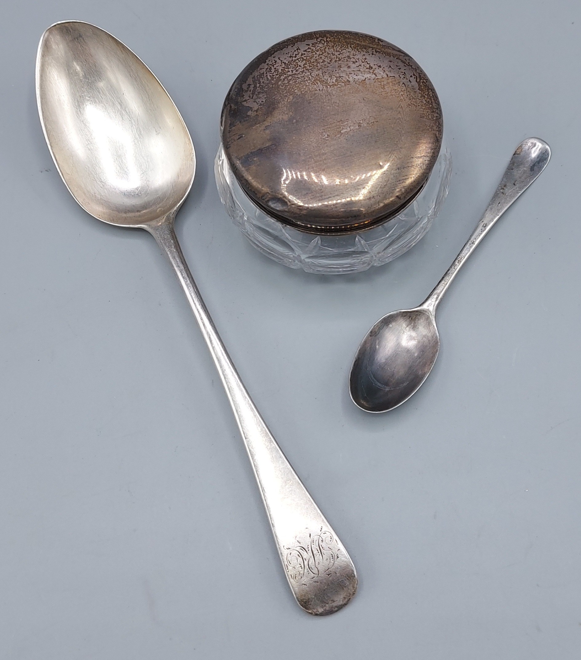 A George III silver table spoon, 1798 together with a silver teaspoon ...