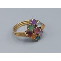 A yellow metal multi stone set ring, ring size L, 3.2gms