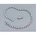 An 18ct white gold Diamond set line bracelet, 12.8gms, 19.5cms long