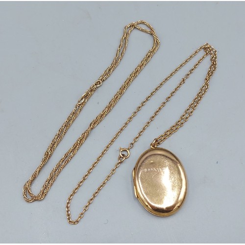 A 9ct gold locket with linked chain together with a 9ct gold neck chain ...