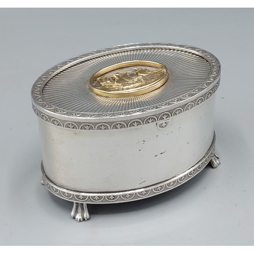 A St James House Company, London silver music box, of oval form, the ...