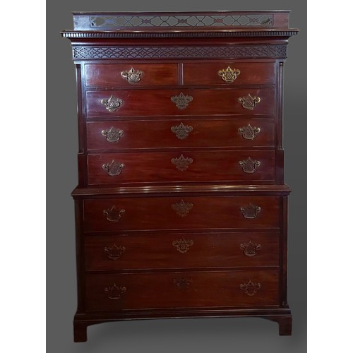 A Regency mahogany chest on chest with a pierced gallery above a ...