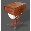 A Victorian drop flap work table fitted with two frieze drawers opposed ...