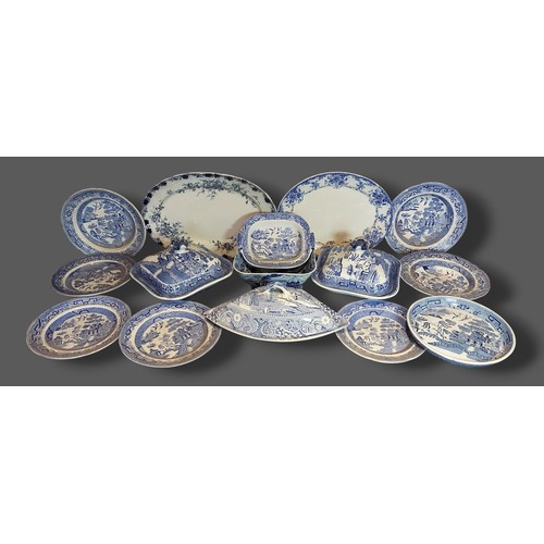 A large blue and white meat platter together with a collection of blue ...