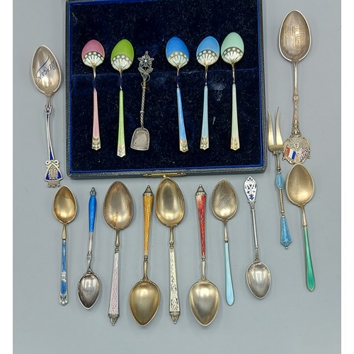 A set of four 930 silver and enamel spoons together with a collection ...