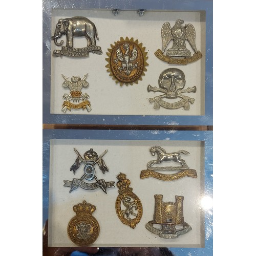 A collection of ten military cap badges to include the 14th Kings ...