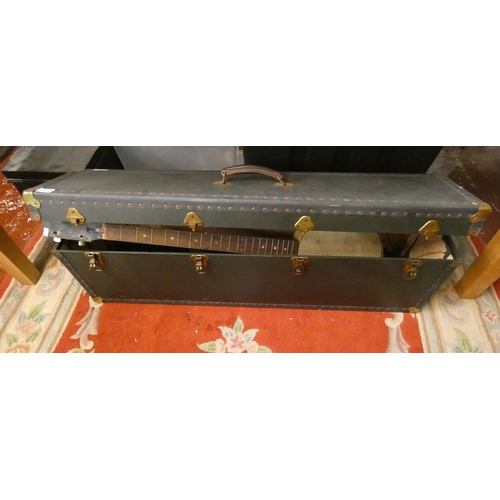 Large carrying case - Approx W: 110cm D: 25cm H: 34cm together with a banjo