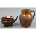 Medieval pipkin circa 1550 together with a stoneware jug