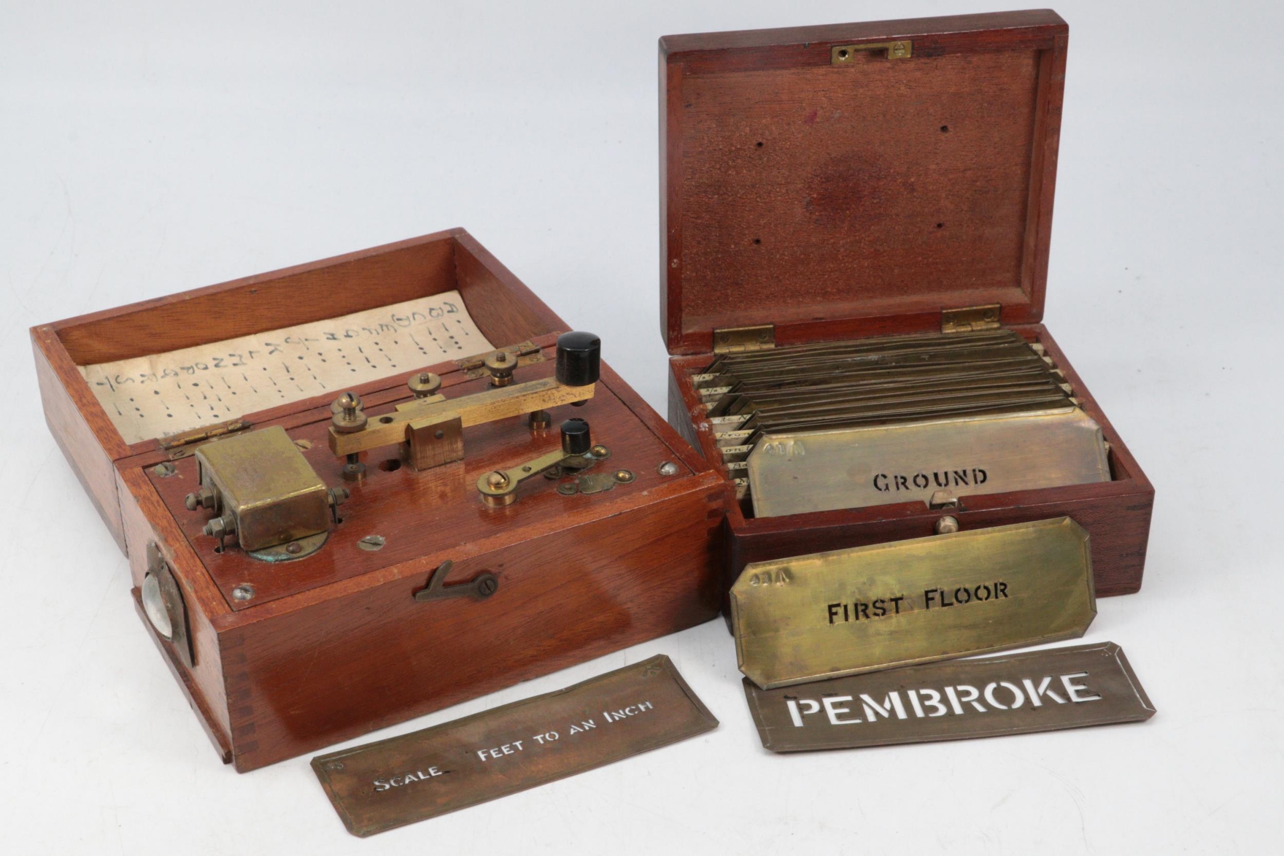 Cased Morse Code Switch Together With A Boxed Selection Of Door Stencils 