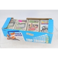 Original 1970's Top Trumps trade box containing 20 different packs of cards