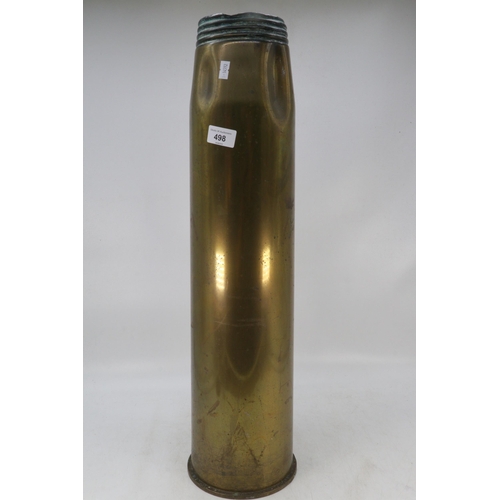 A large brass shell case