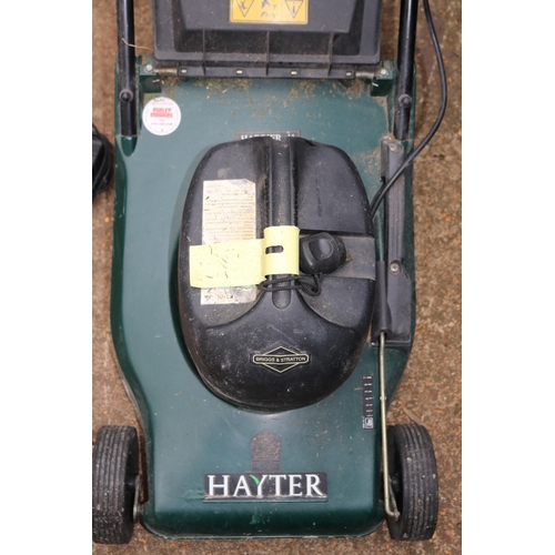 A Hayter Harrier 41 battery operated mower with charger and grass ...
