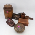 Oriental carved pot and lid with face mask and baton? together with 3 ...