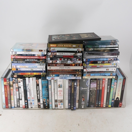 A quantity of DVD's covering a wide variety of interests; TV, serial ...