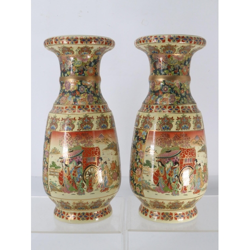 A pair of reproduction Japanese vases