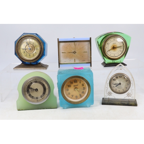 Cyma amic swiss bedside alarm clock togehter with a selection of small ...