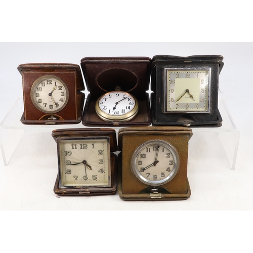 Five leather cased travel clocks