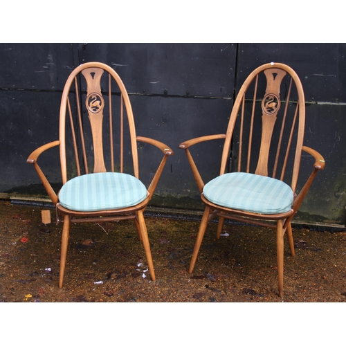 Pair of Ercol Swan back chairs