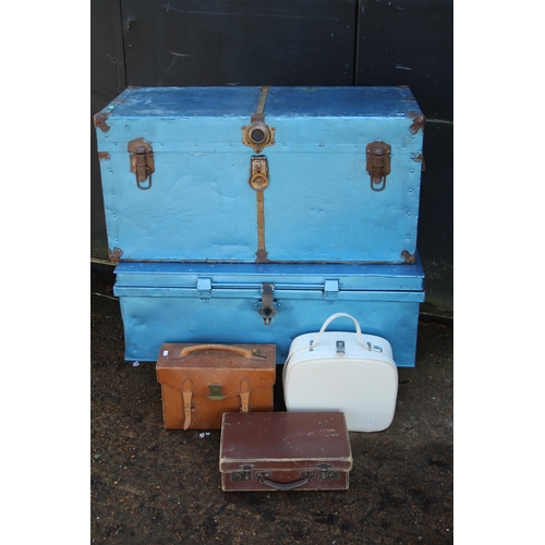 Three vintage cases together with two large painted trunks