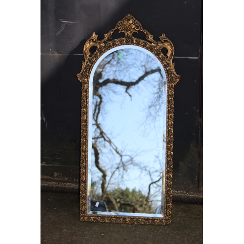 Gilt framed bevel edged mirror